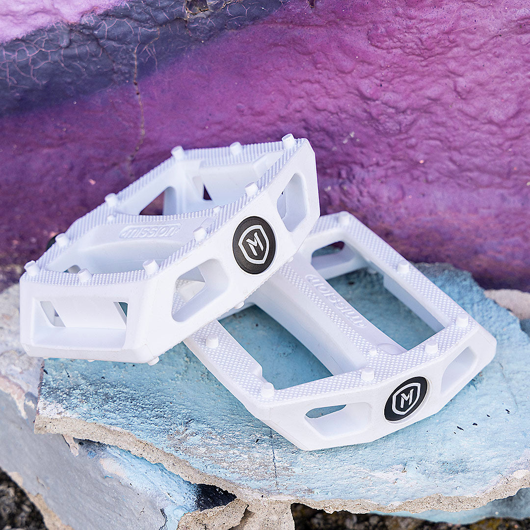 Bright white Mission Impulse pedals. – Mission BMX